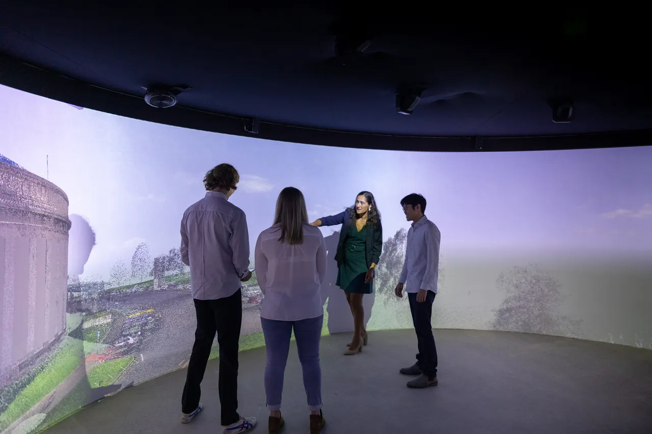 Woman giving presentation in immersion lab